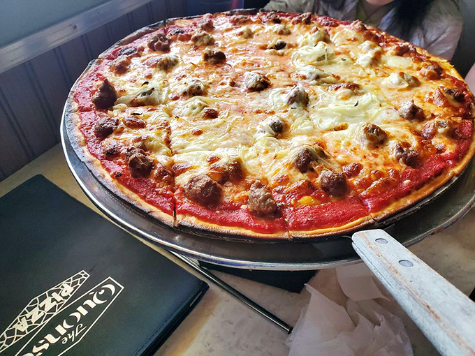 Sausage pizza that would make Tony Soprano nod with approval. Those little flavor bombs aren't just toppings&mdash;they're the reason stretchy pants were invented.