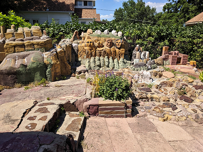 These limestone figures stand as silent sentinels in the Garden of Eden, proof that one man's artistic vision can transform a small Kansas town forever.