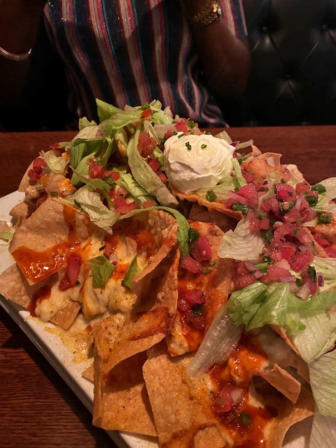 Seafood nachos that defy gravity and expectations. This towering masterpiece of chips, cheese, and fresh seafood makes sharing nearly impossible&mdash;you've been warned.