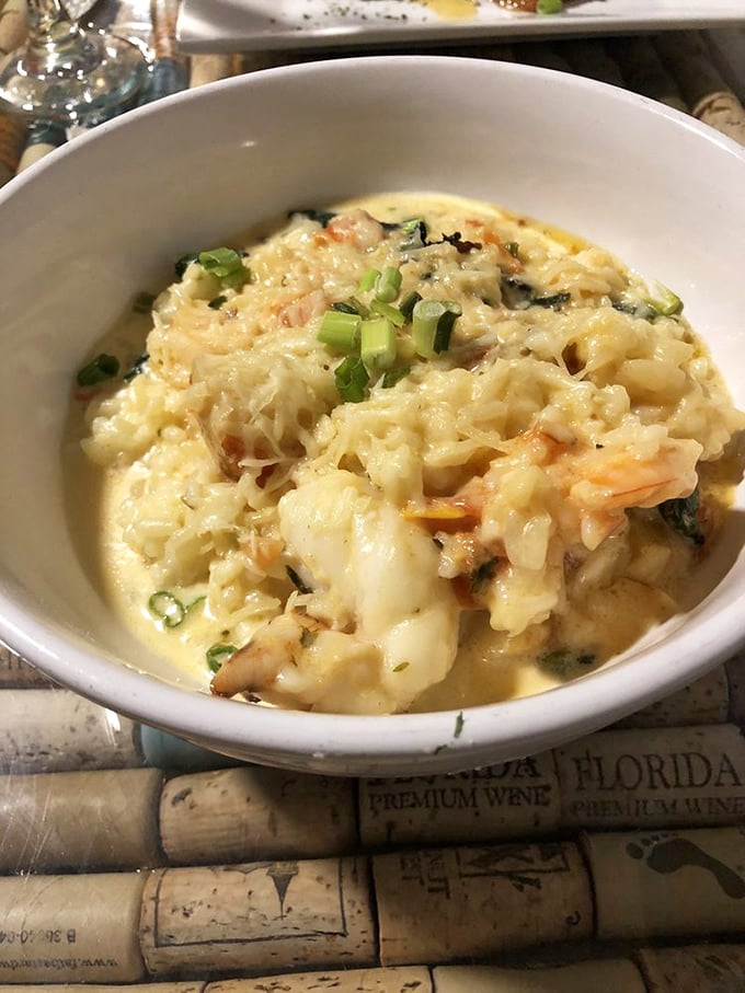 The seafood risotto &ndash; a creamy, dreamy ocean of flavors where shrimp and scallops swim in perfect harmony with al dente rice.