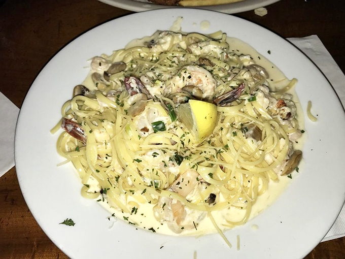 Seafood pasta that doesn't skimp on the good stuff &ndash; every twirl of linguine delivers oceanic treasures and herby goodness.