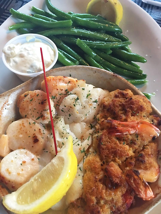 This seafood platter is what happens when the ocean's finest treasures meet culinary respect. Those scallops are calling my name!