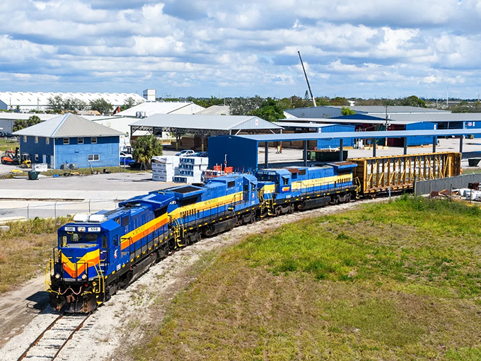 The workhorse side of Seminole Gulf Railway, hauling cargo through Southwest Florida's industrial corridors with colorful efficiency.