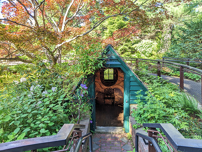 Not your average garden shed! This whimsical structure looks like it was designed by hobbits with architectural degrees and excellent taste.