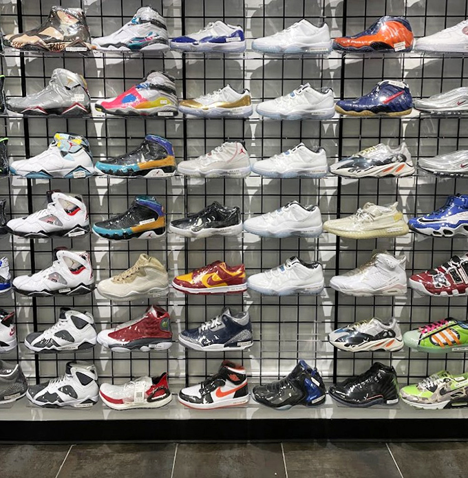 Sneakerheads, rejoice! This wall of athletic footwear offers last season's must-haves at this season's must-buy prices. Your feet and wallet will thank you.