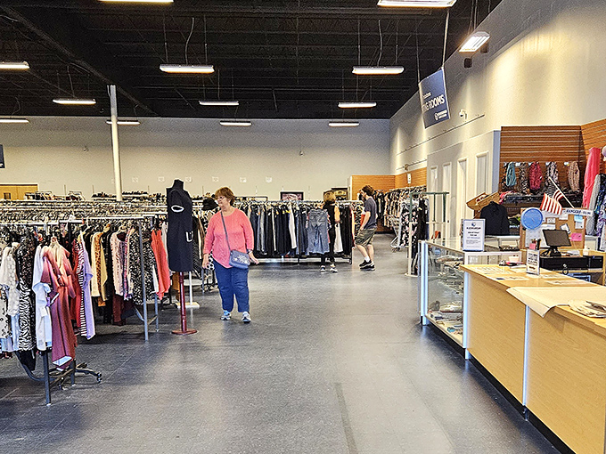 Real shoppers in their natural habitat, stalking the elusive perfect find among endless racks.