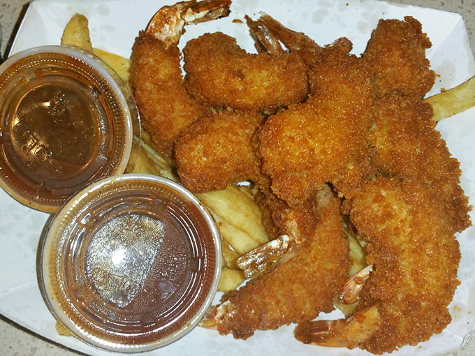 Crispy fried shrimp with dipping sauce on the side. A maritime detour that proves Lem's mastery extends beyond the smokehouse.
