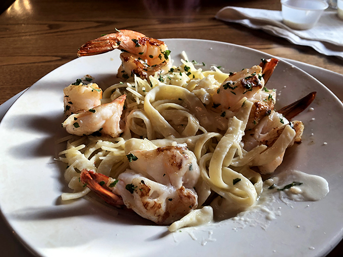 Shrimp alfredo that proves pasta and seafood belong together, with perfectly cooked shrimp nestled in creamy, herb-flecked noodles worth twirling.
