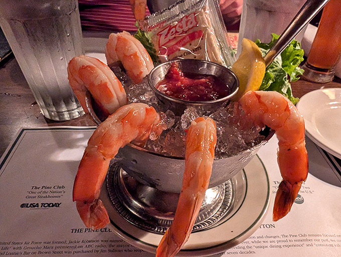 These jumbo shrimp cocktail aren't just appetizers &ndash; they're ocean ambassadors perched on ice, waiting to be dipped in that tangy red sauce.