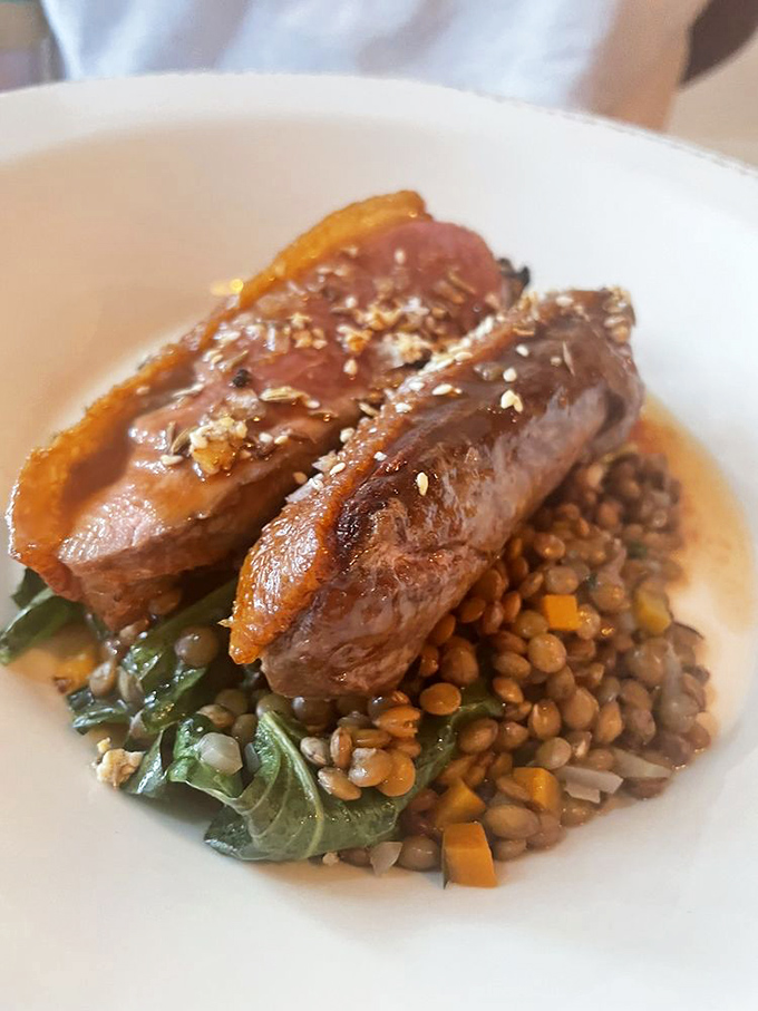 Slagel duck breast resting on a bed of lentils demonstrates why proper technique transforms simple ingredients into something truly memorable and satisfying.