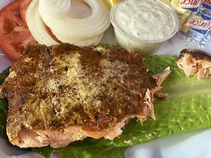Blackened salmon that doesn't need fancy plating&mdash;just lettuce, tomato, onion, and the confidence of being absolutely delicious.