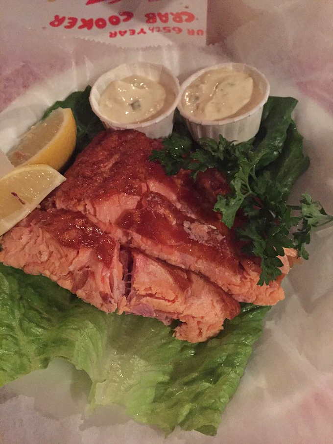 This smoked salmon doesn't just flake—it surrenders to your fork in delicate, coral-colored petals that taste like the ocean's sweetest kiss.