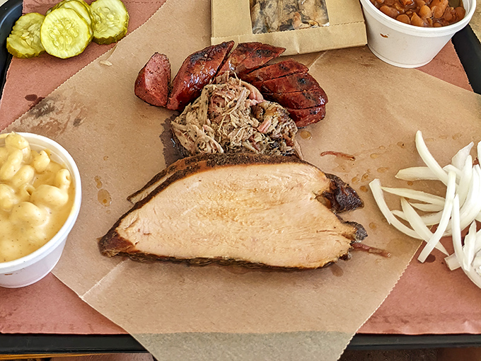 The barbecue sampler plate—where FOMO is eliminated and joy is multiplied. That smoke ring on the turkey is what dreams are made of.
