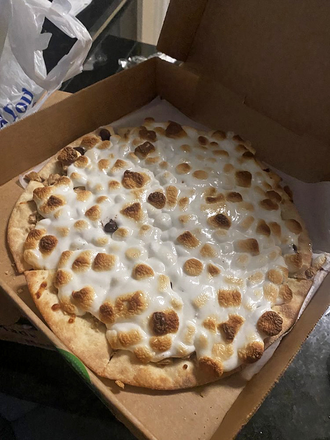 S'more pizza proves that campfire nostalgia and Italian tradition can coexist in one gloriously gooey, marshmallow-topped creation.