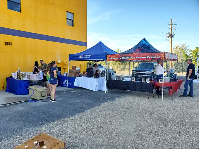 Community happens in unexpected places&mdash;like these pop-up vendors creating a festival atmosphere before showtime. Small-town magic at its finest.