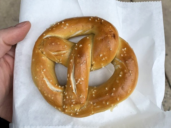 The classic pretzel twist &ndash; part geometry lesson, part culinary masterpiece. This golden-brown beauty has the perfect salt-to-dough ratio that would make any Bavarian proud.