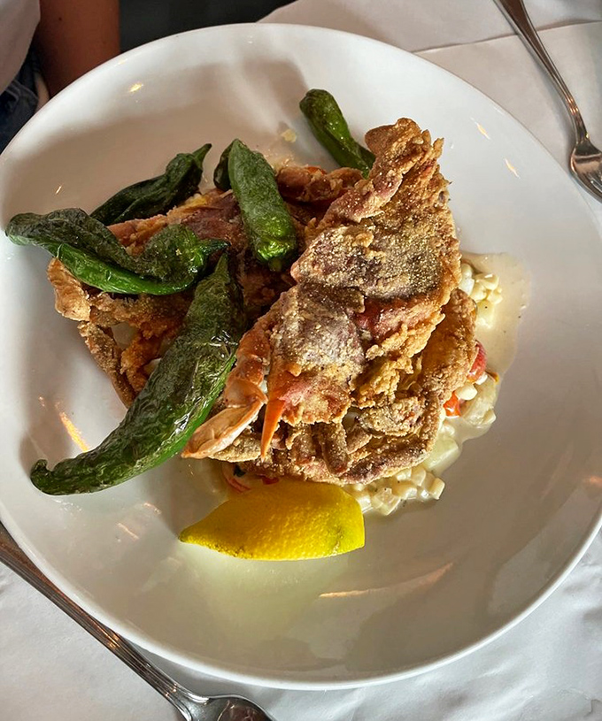 Soft shell crab perched atop risotto like a crispy crown jewel&mdash;proof that sometimes the best things in life require a little crunch.