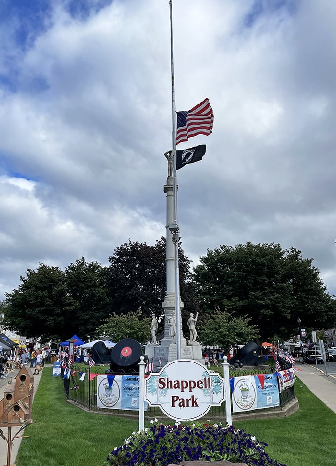 The Soldiers' and Sailors' Monument stands tall in Shappell Park, honoring veterans while providing a central gathering place for community events.