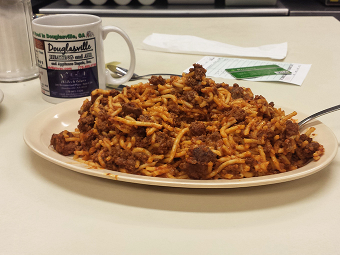 This hearty spaghetti with meat sauce isn't trying to be Italian; it's proudly diner-American—the kind that fuels both body and nostalgia.