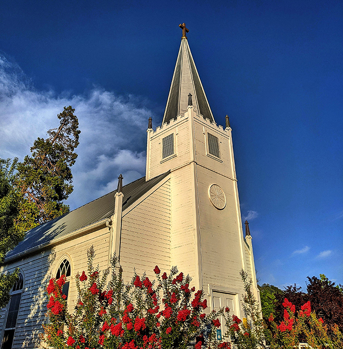 This charming white church with its soaring steeple and vibrant flowers stands as a testament to Mariposa's enduring community spirit.