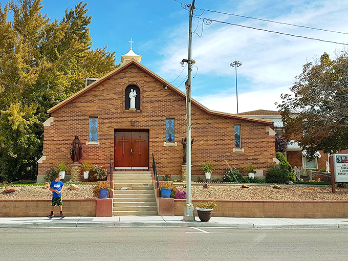 St. Anthony's brick facade has welcomed worshippers for generations, its warm tones perfectly complementing the rugged landscape that surrounds it.