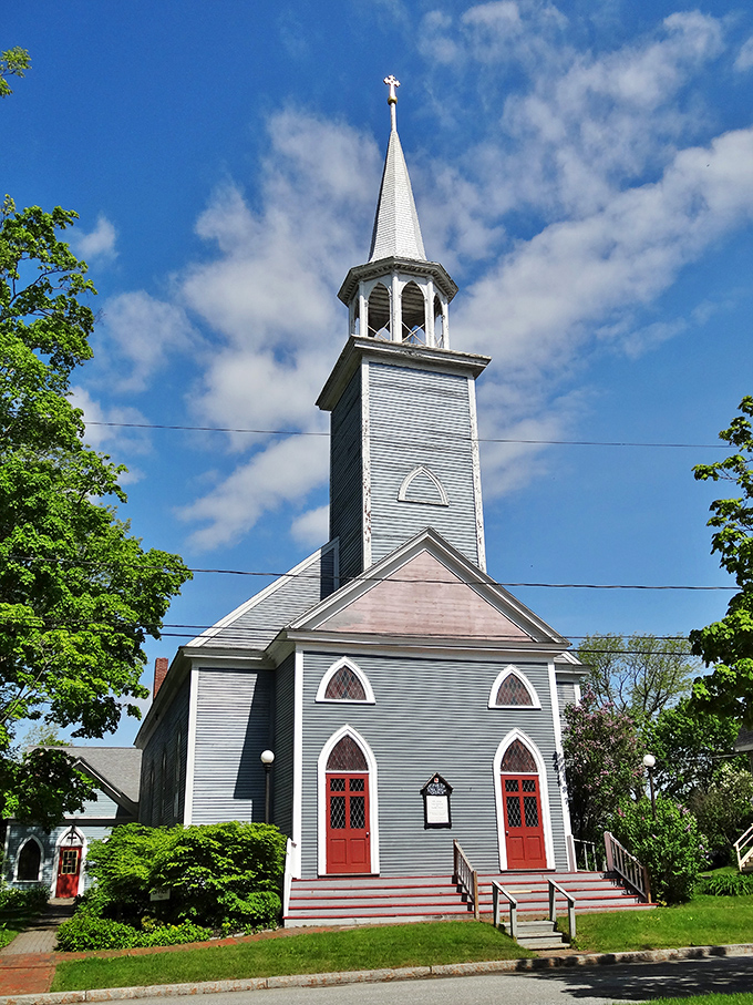 St. Philip's Episcopal Church stands as a postcard-perfect example of New England ecclesiastical architecture, its white steeple reaching skyward like a spiritual exclamation point.