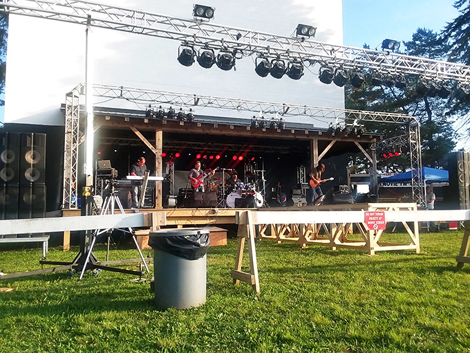 When the screen isn't showing blockbusters, live bands transform the drive-in into an impromptu concert venue under open skies.
