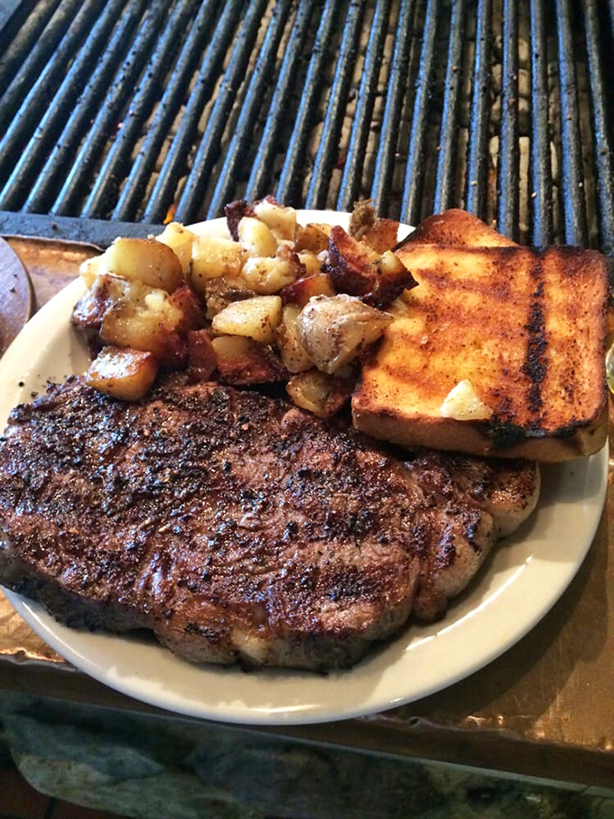 Meat perfection achieved. That sear, those potatoes, that toast&mdash;a holy trinity of steakhouse excellence on a single plate.