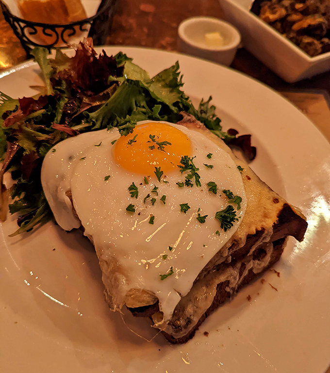 The croque madame that puts ordinary breakfast sandwiches to shame. That sunny-side-up egg is nature's perfect sauce delivery system for this French classic.
