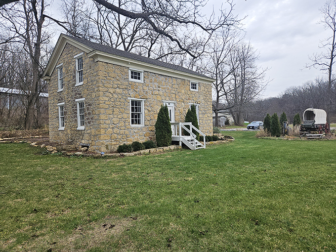 This limestone building has witnessed more history than most textbooks, standing solid while everything else keeps changing around it.