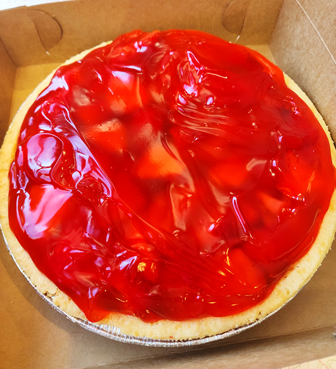 Behold the crown jewel of Midwestern desserts &ndash; a strawberry pie glistening with that signature glaze that somehow makes fruit count as comfort food.