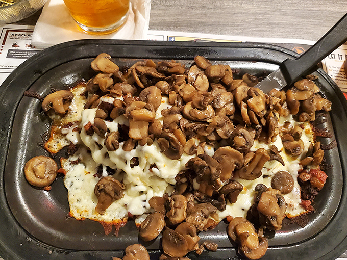 A mountain of mushrooms crowns this stuffed tenderloin masterpiece &mdash; the kind of hearty comfort that proves elegance and indulgence can share a plate.