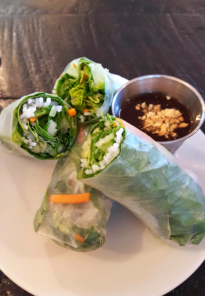 Nature's perfect appetizer: summer rolls that showcase the art of restraint, where every translucent wrapper reveals the garden of delights within.