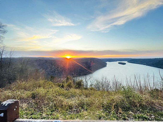 The sun performing its daily magic trick&mdash;disappearing behind hills while painting the sky in colors no Instagram filter could improve.