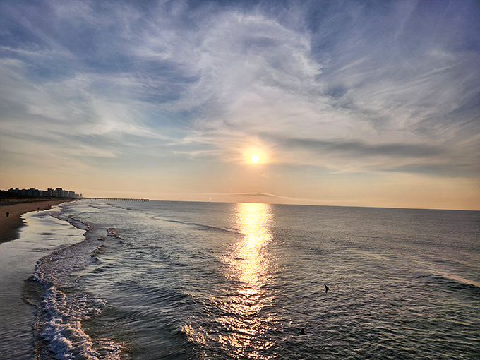 When the sun clocks out for the day, it leaves a golden paycheck painted across the Atlantic.