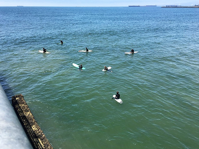 Surfers patiently wait for nature's perfect timing, a meditation practice that happens to come with the thrill of riding waves.