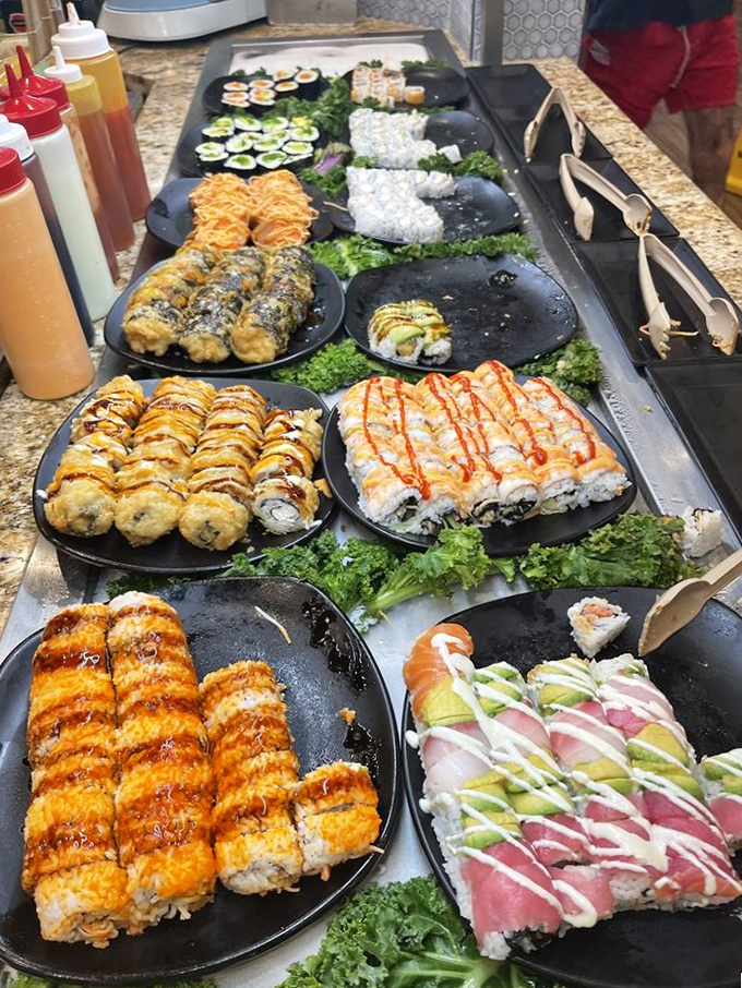 The sushi station &ndash; where California rolls meet artistic presentation. Those sauce drizzles aren't just pretty; they're the difference between good and transcendent.