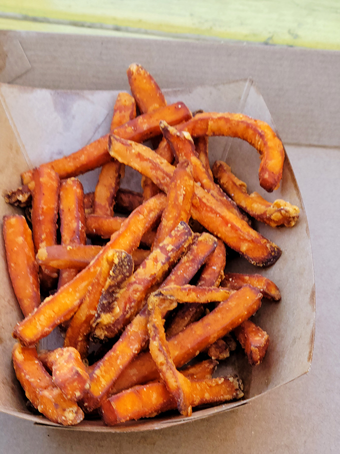 Sweet potato fries that look like they've been kissed by the sun &ndash; crispy, golden, and begging to be dunked in something delicious.