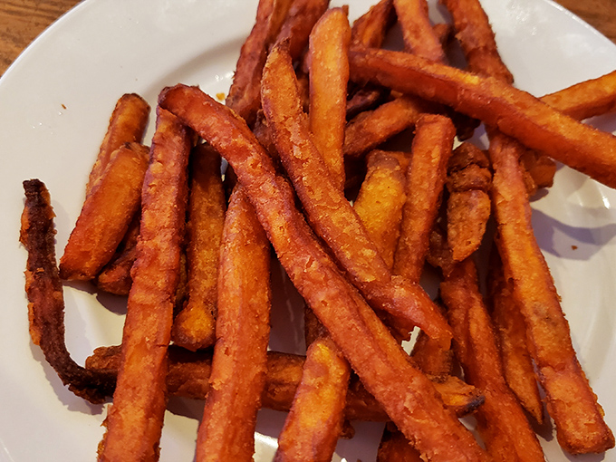 Sweet potato fries that achieve the impossible: perfectly crisp exteriors giving way to tender, sweet interiors &ndash; the Goldilocks of side dishes.