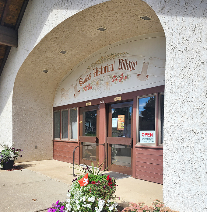 The Swiss Historical Village Museum entrance beckons visitors to step back in time. History lessons were never this charming in school.