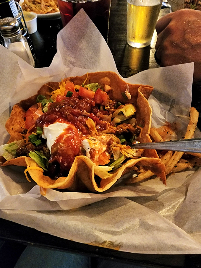 That taco salad bowl could double as a small swimming pool for very tiny, very hungry people.
