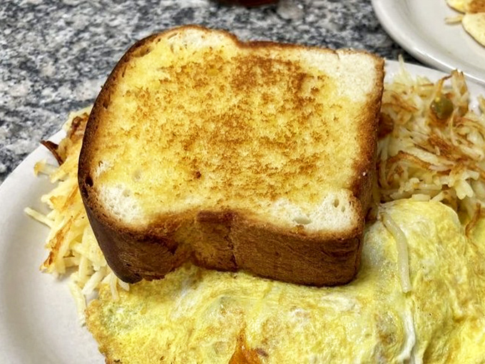 Texas toast isn't just bread&mdash;it's an architectural marvel supporting a perfect omelet. Like the state itself, everything here is just a little bigger and a lot more satisfying.