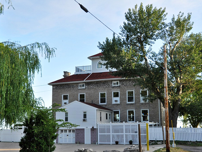 The Alexander Clemons House whispers stories of limestone quarrymen and lake captains through its sturdy walls and widow's walk.