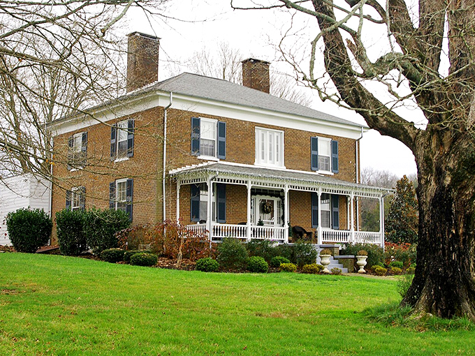 The John McCroskey House stands as a testament to classic Southern architecture, its wraparound porch practically begging for rocking chairs and sweet tea.