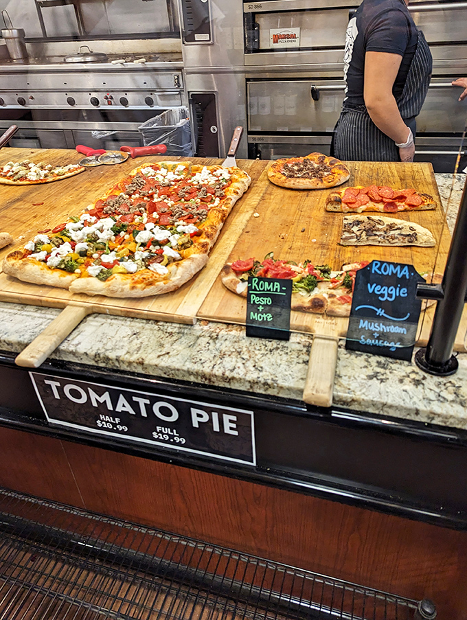 Tomato pie paradise! Each rectangular canvas showcases a different artistic approach to the timeless combination of dough, sauce, and toppings.