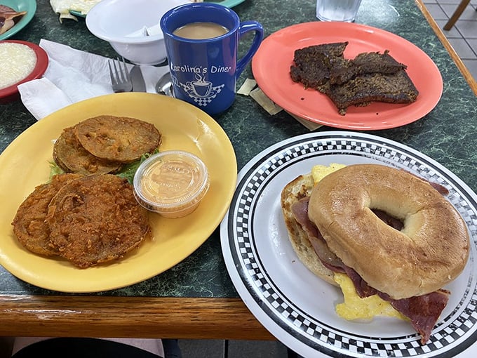 A breakfast spread that speaks the universal language of "good morning" &ndash; fried tomatoes, breakfast sandwich, and meatloaf that doesn't care what time it is.