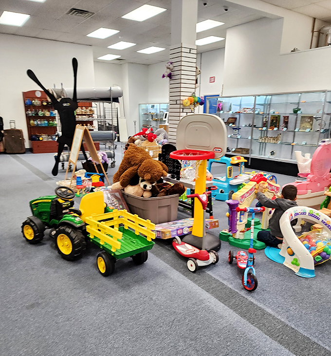 Toy section magic where childhood dreams get a second chance. That John Deere tractor looks ready for new backyard adventures.