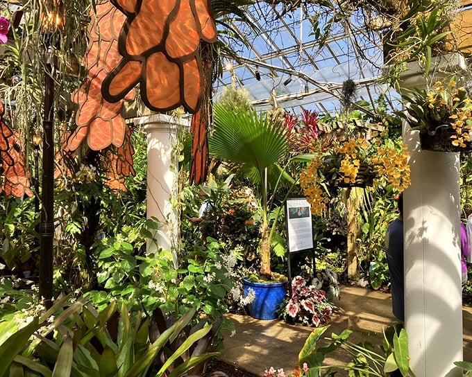Stained glass flowers dance overhead in the Tropical Conservatory, where even the most dedicated plant-killer will find inspiration.