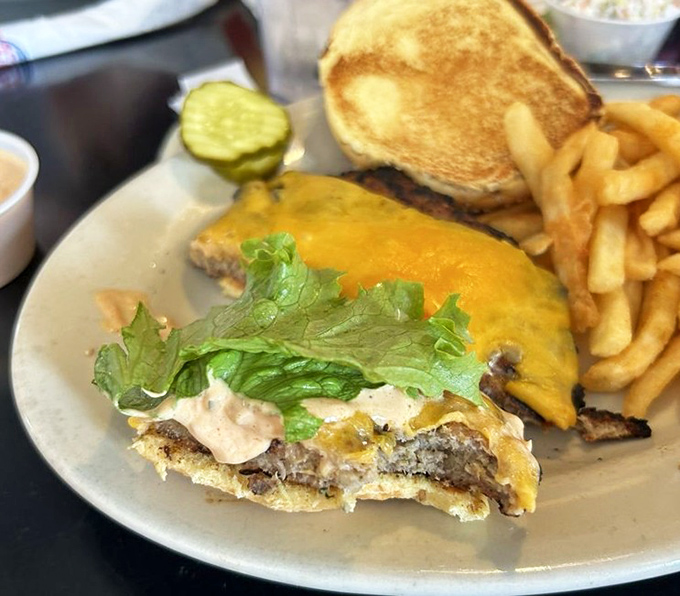 First bite magic!&rdquo; Melted cheddar clings to the patty like an old friend, while crisp lettuce adds a refreshing crunch.
