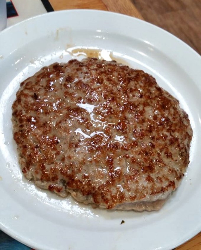 This sausage patty deserves its own fan club. Juicy, perfectly seasoned, and ready for its breakfast stardom.